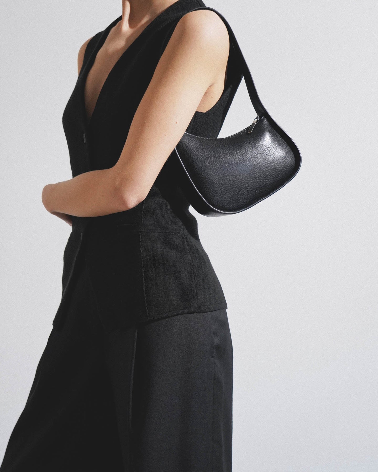 The Row | Half moon black leather bag | Savannahs