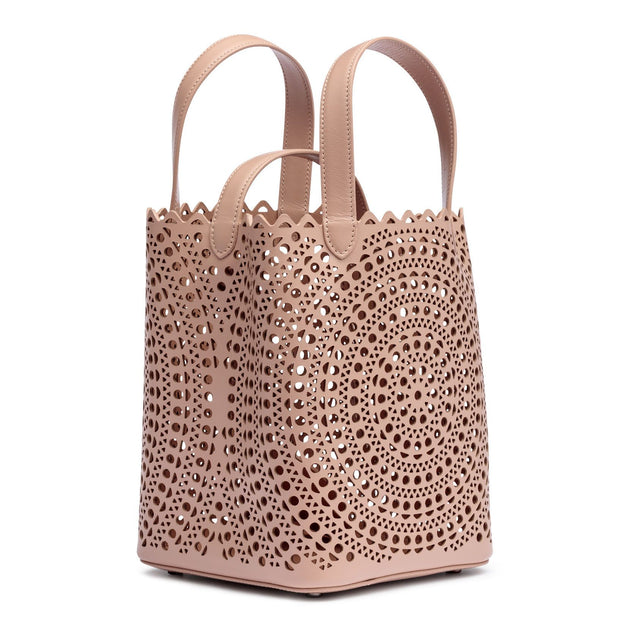 Alaïa | Beige laser-cut leather small bucket bag | Savannahs
