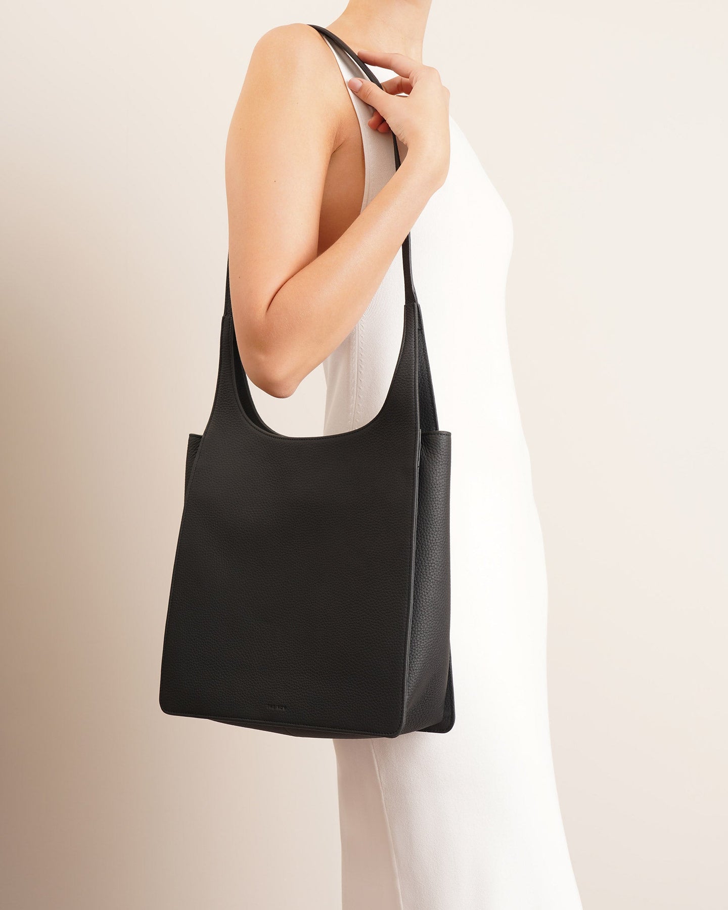 The Row | Jules black leather tote bag | Savannahs
